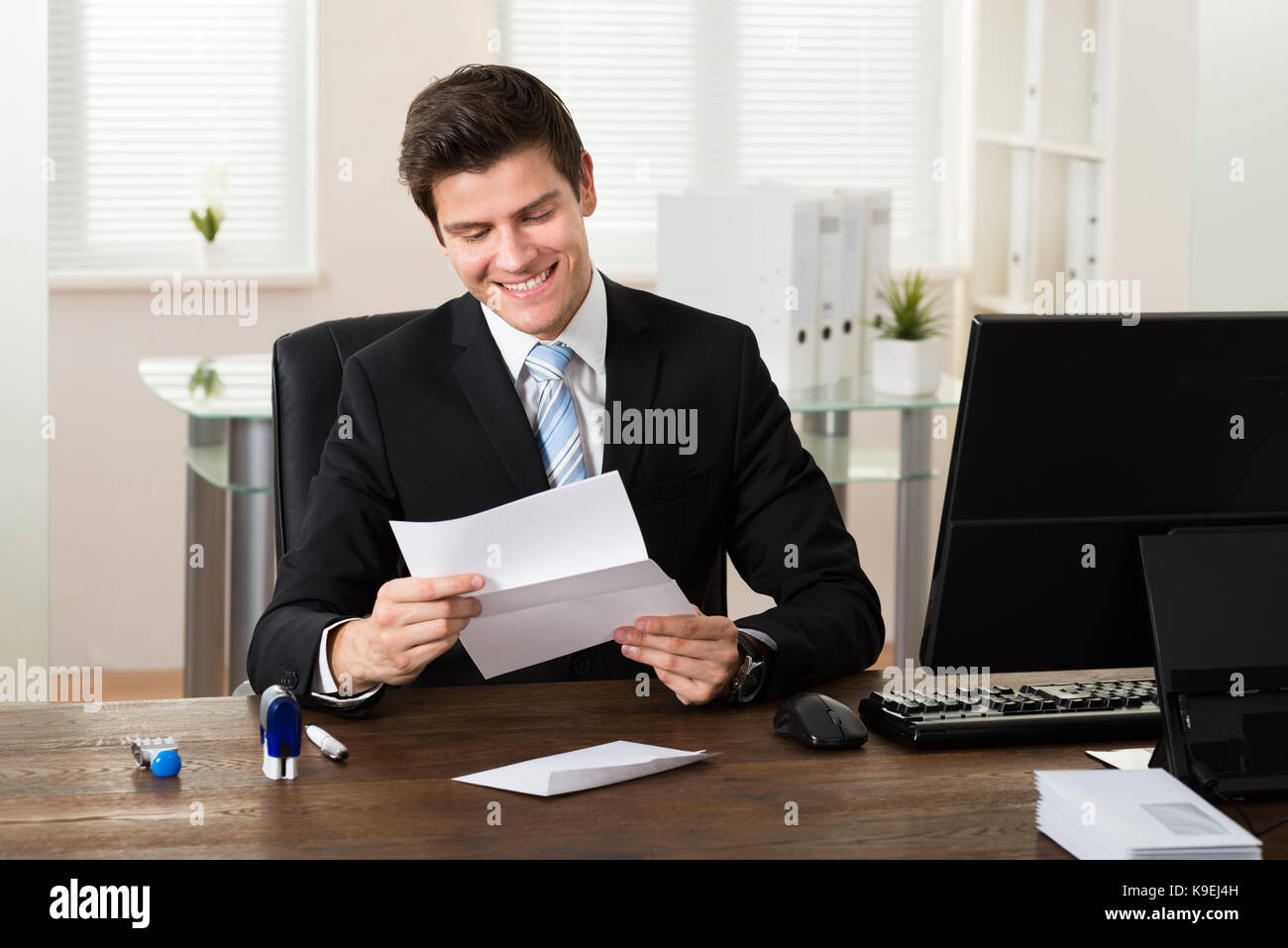 Document envelope hi-res stock photography and images - Alamy