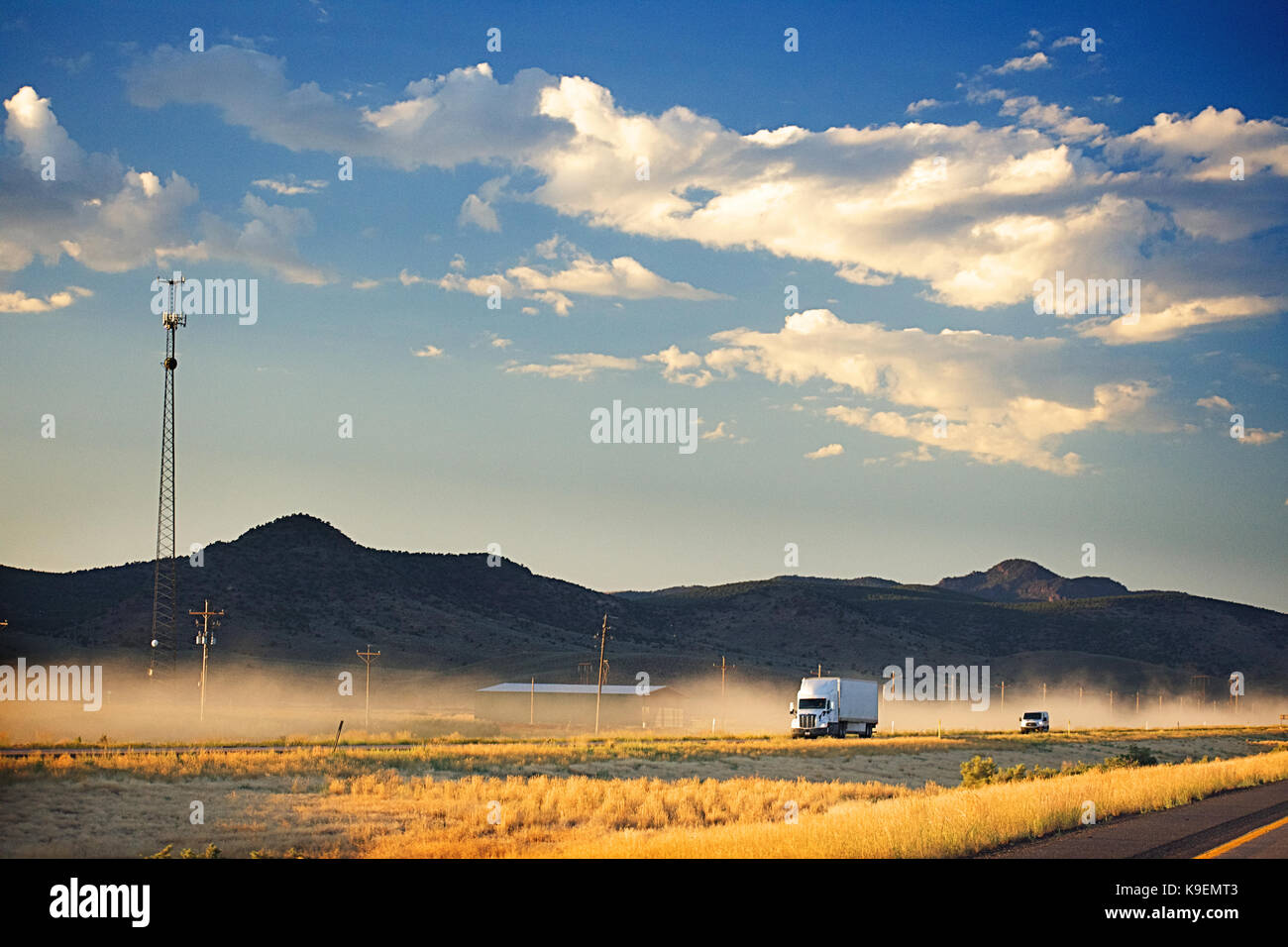 Dusty highway travel landscape Stock Photo - Alamy