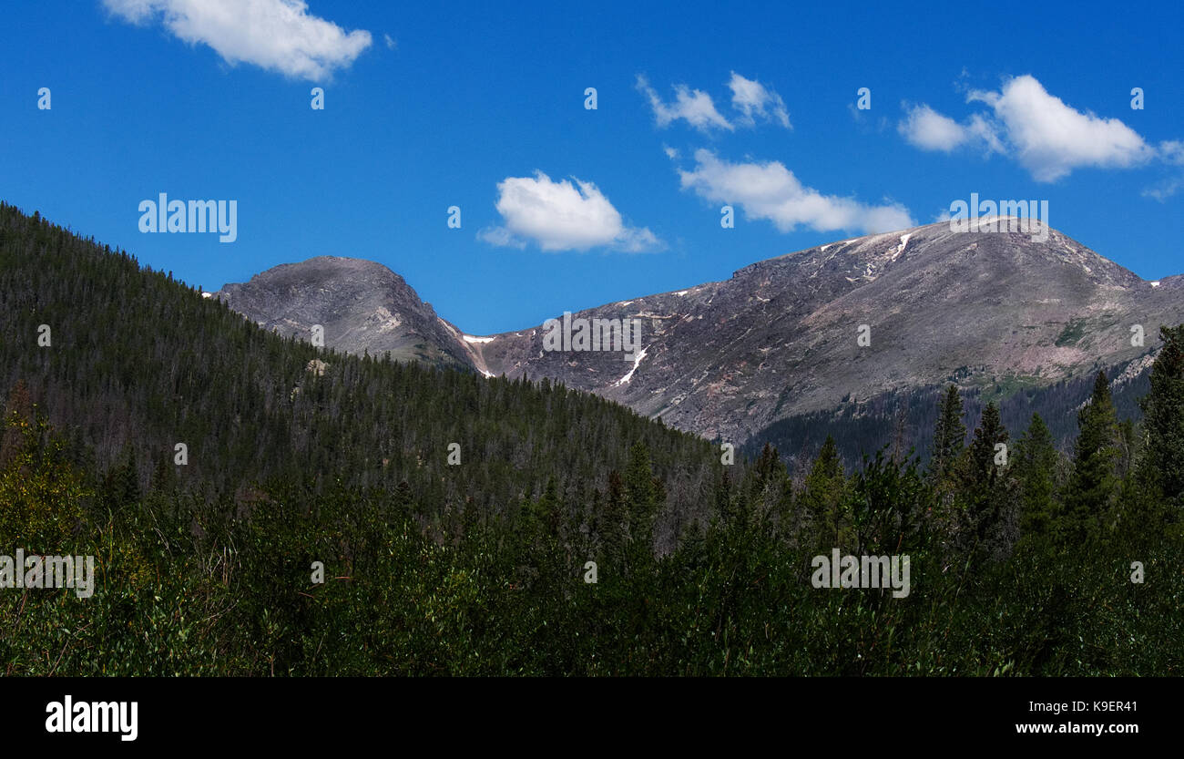 Colorado Mountain with blue, cloudy sky Stock Photo - Alamy