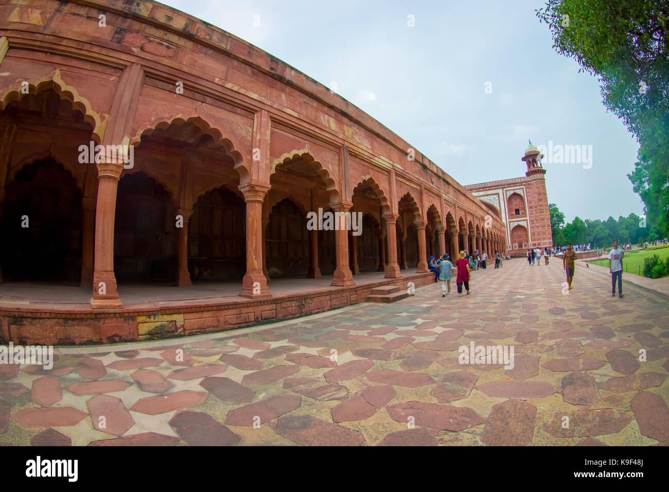 Agra, India - September 20, 2017: Outdoor view of a stoned path with ...