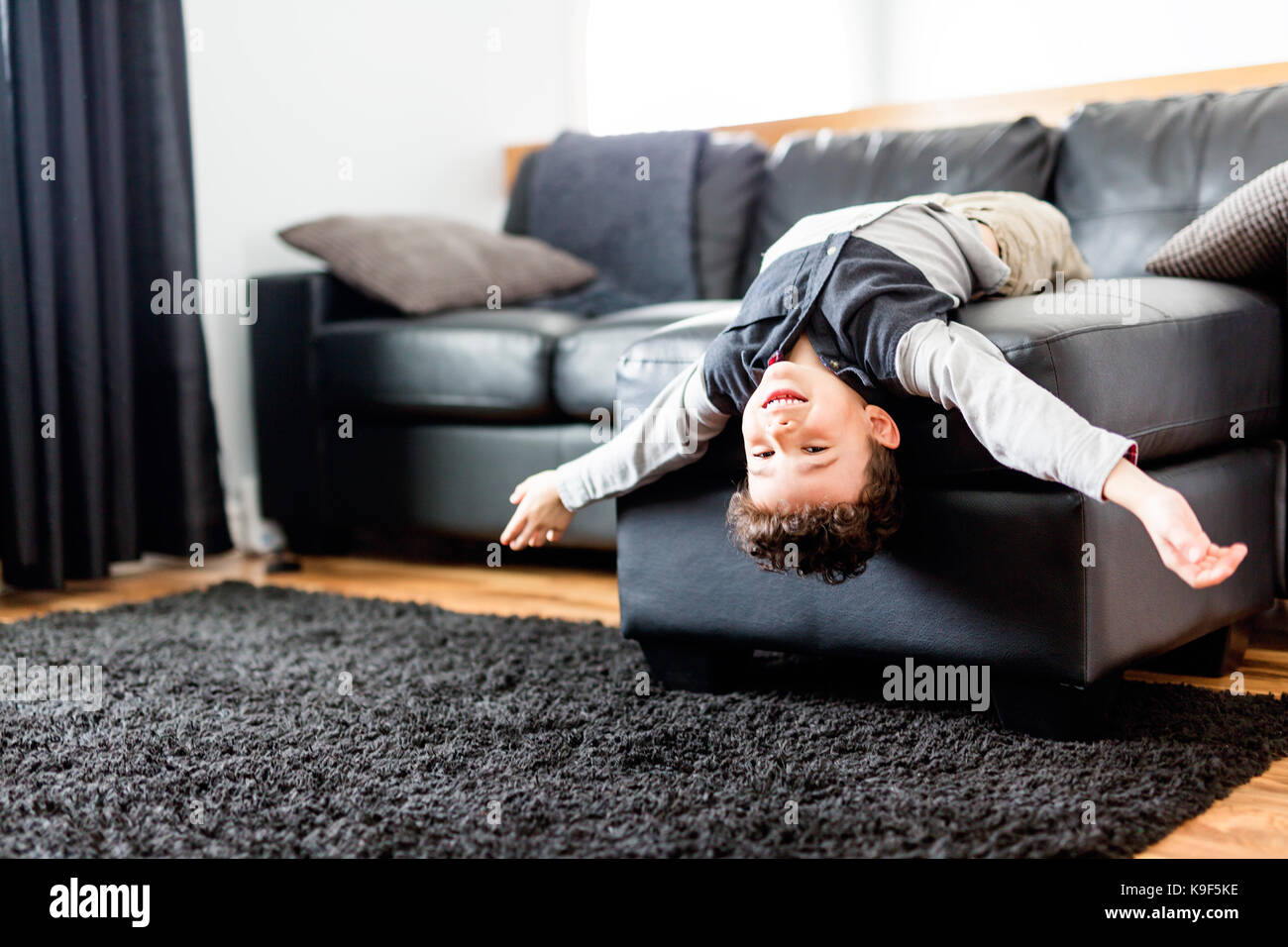 Upsidedown playing hi-res stock photography and images - Alamy