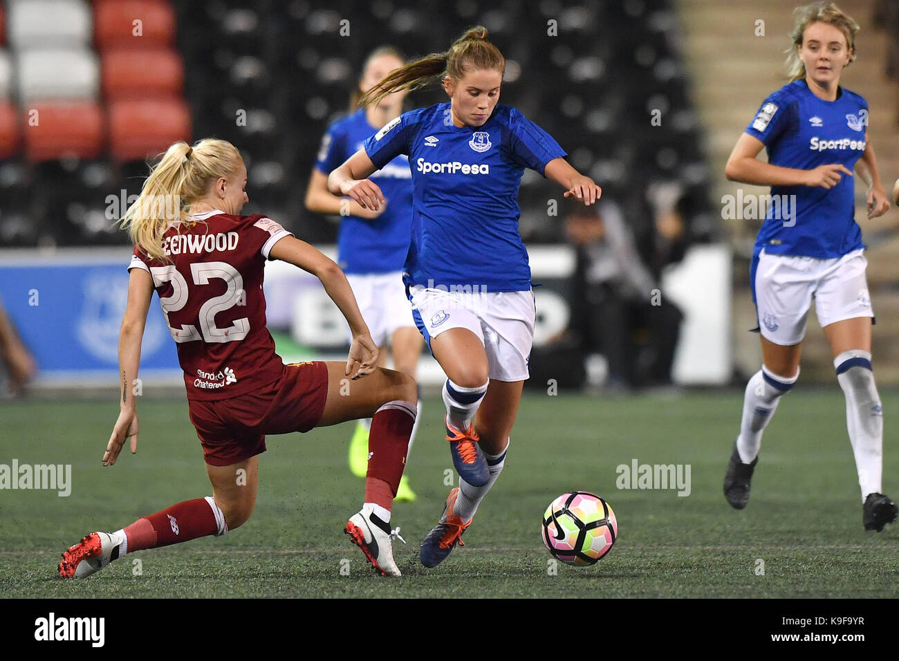 Everton's Georgia Brougham avoids a challenge from Liverpool's Alex ...