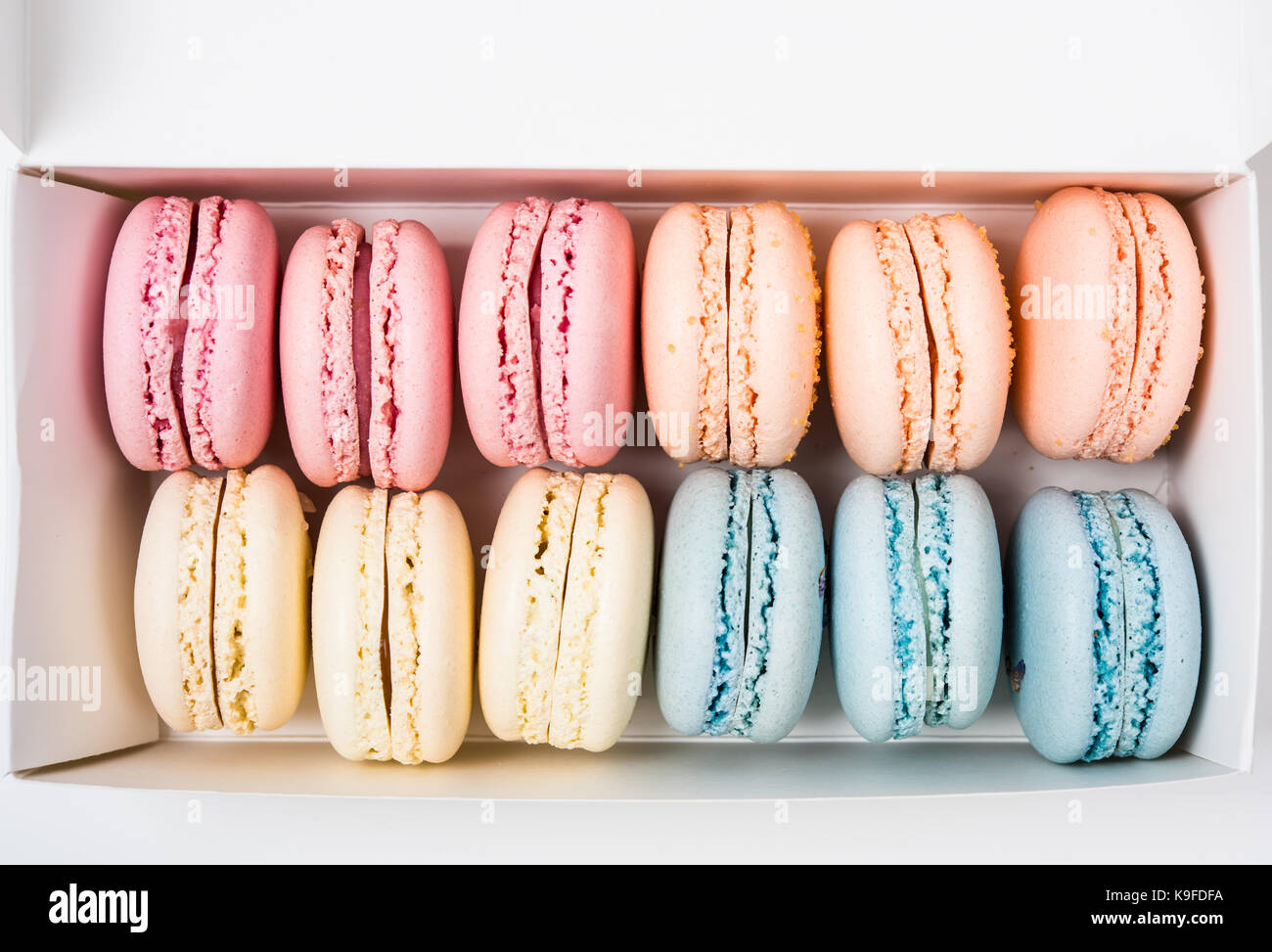Colorful assorted macaroon cookies in a gift box, european desserts ...