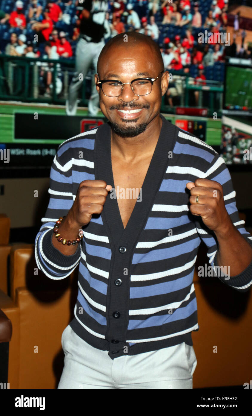 Boxing Champ Sugar Shane Mosley cuts the ribbo and places honorary ...