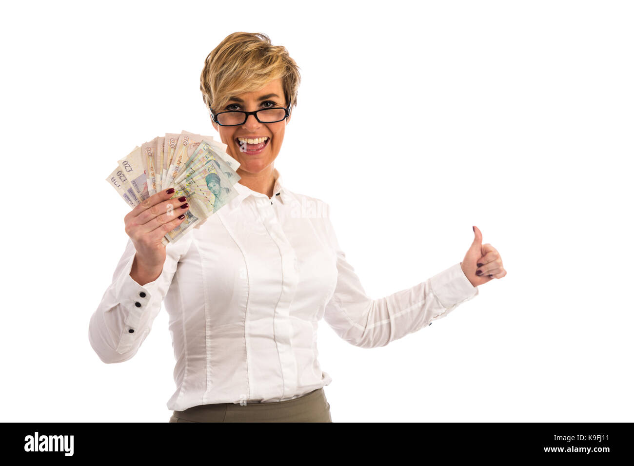 A succesful business woman with a handful of cash Stock Photo - Alamy