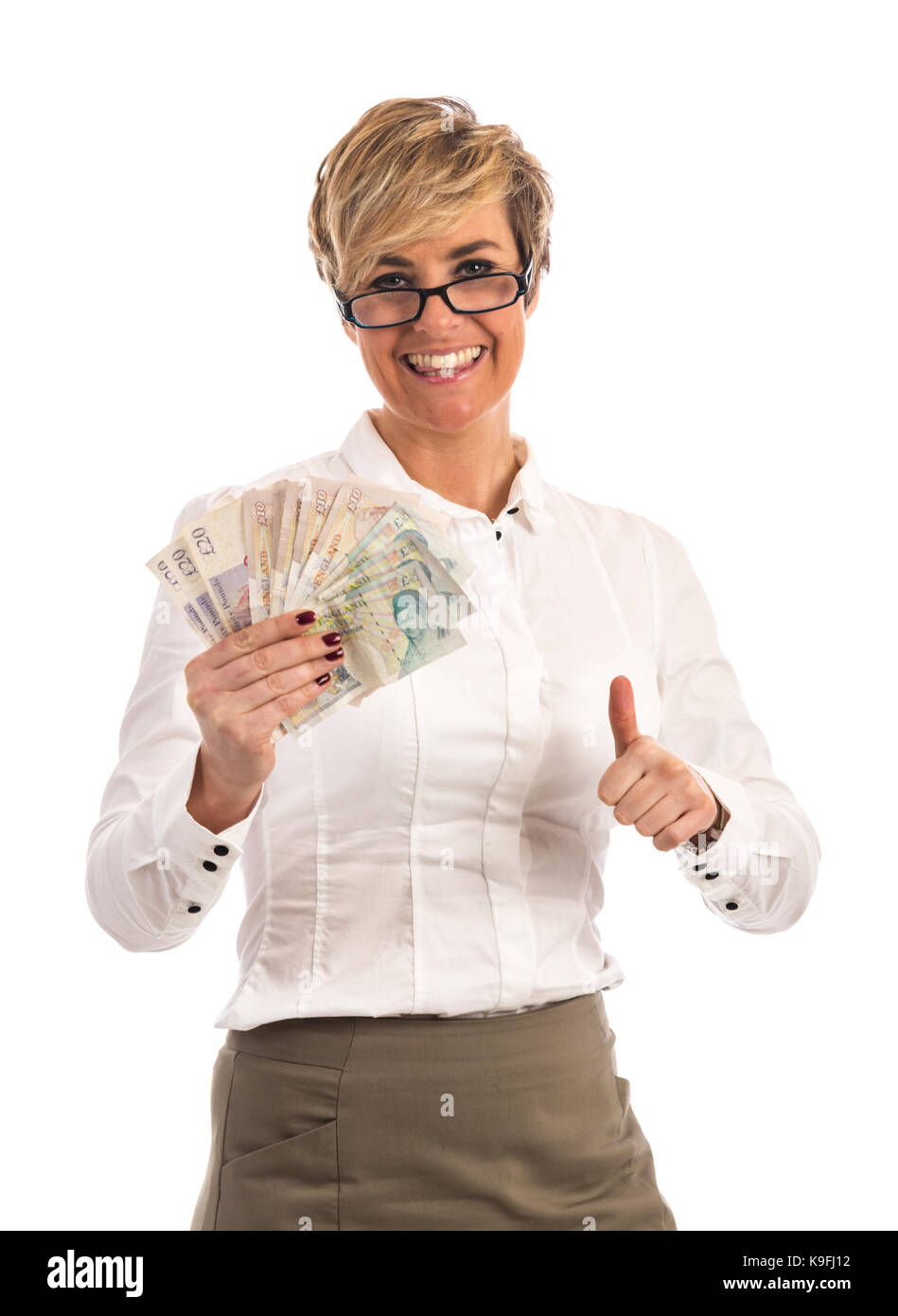 A succesful business woman with a handful of cash Stock Photo - Alamy