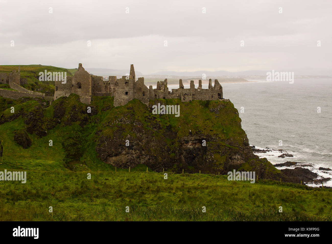 The historic Dunluce Castle ruins near Bushmills on the North Antrim ...