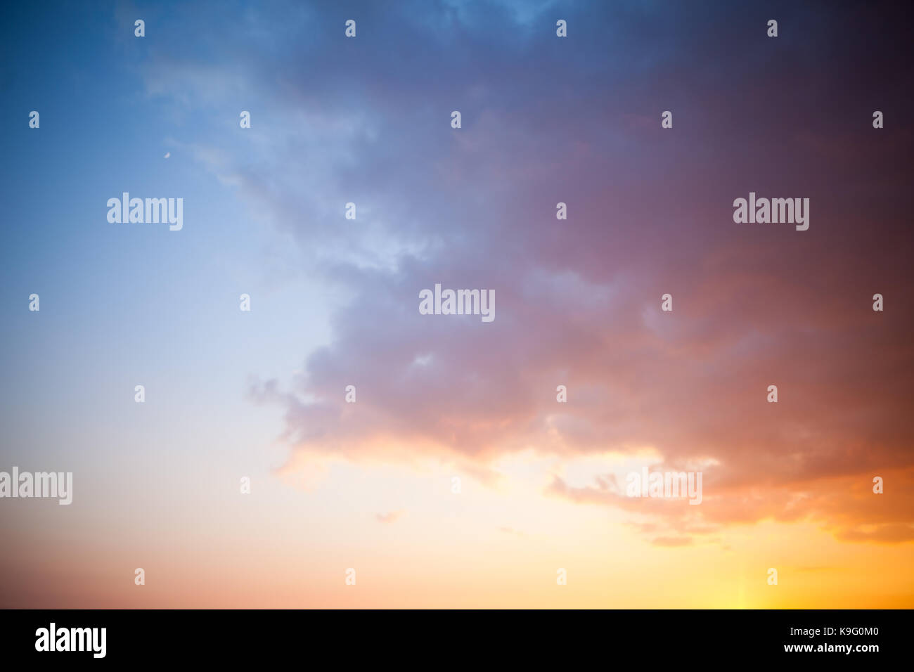 Colorful background: sky overlay, setting sun Stock Photo - Alamy