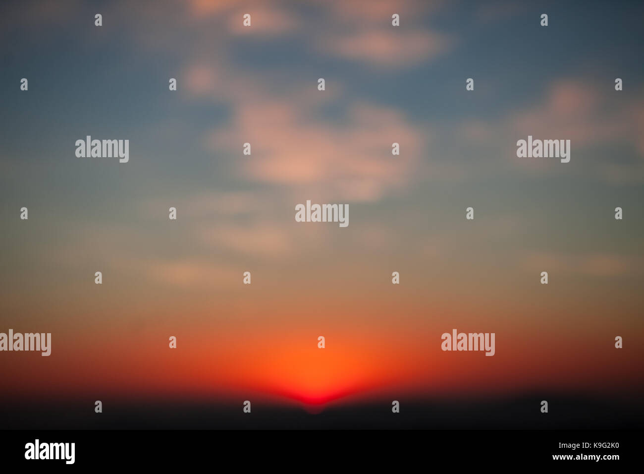 Colorful background: sky overlay, setting sun Stock Photo - Alamy