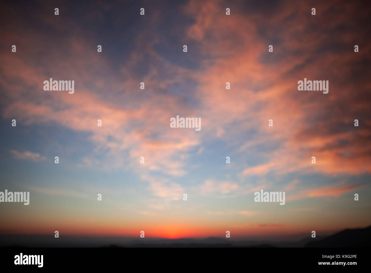Colorful background: sky overlay, setting sun Stock Photo - Alamy