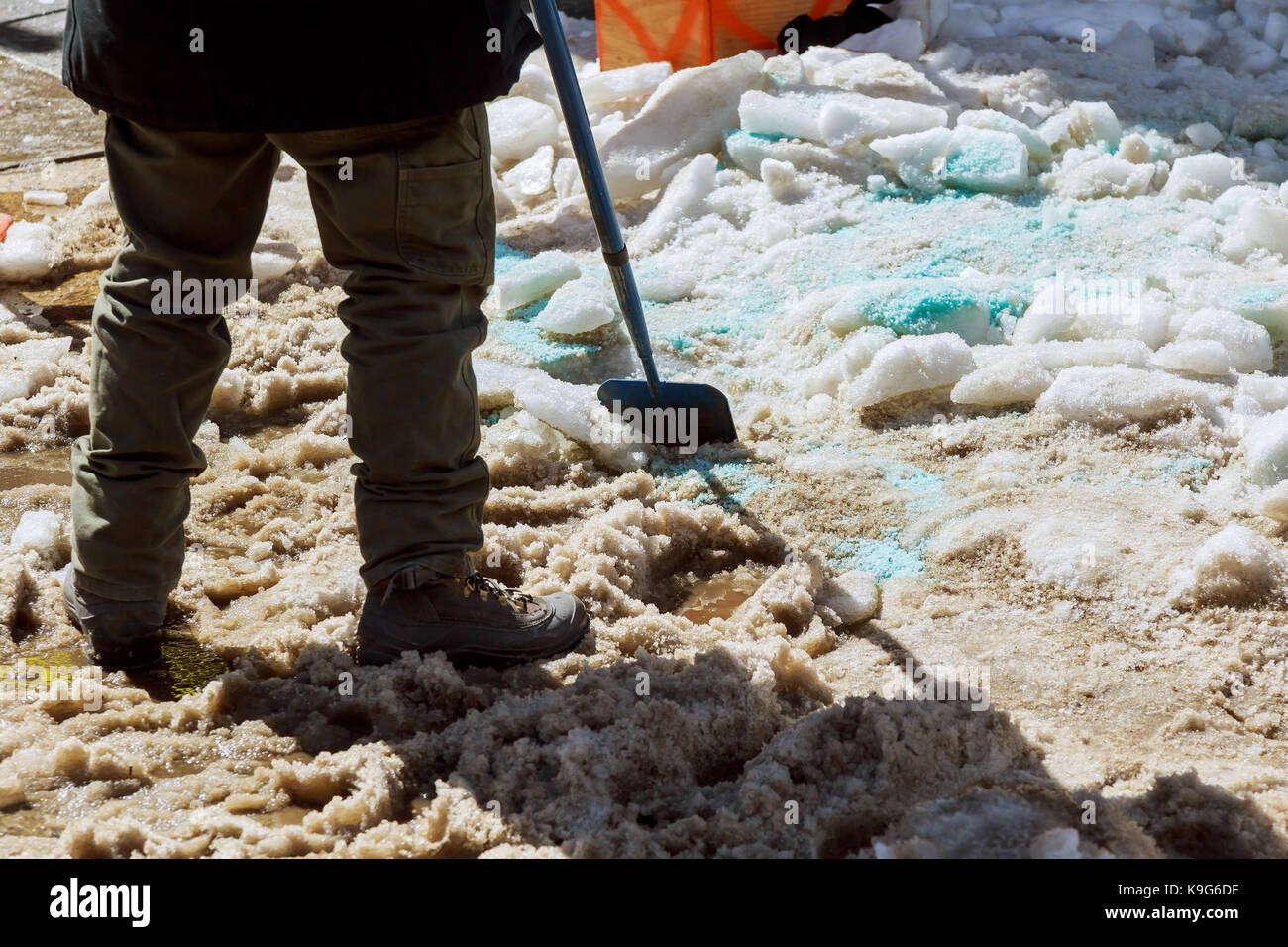 Workers cleaners snow in the city Janitor cleans the street of snow in ... Workers cleaners snow in the city Janitor cleans the street of snow in ...