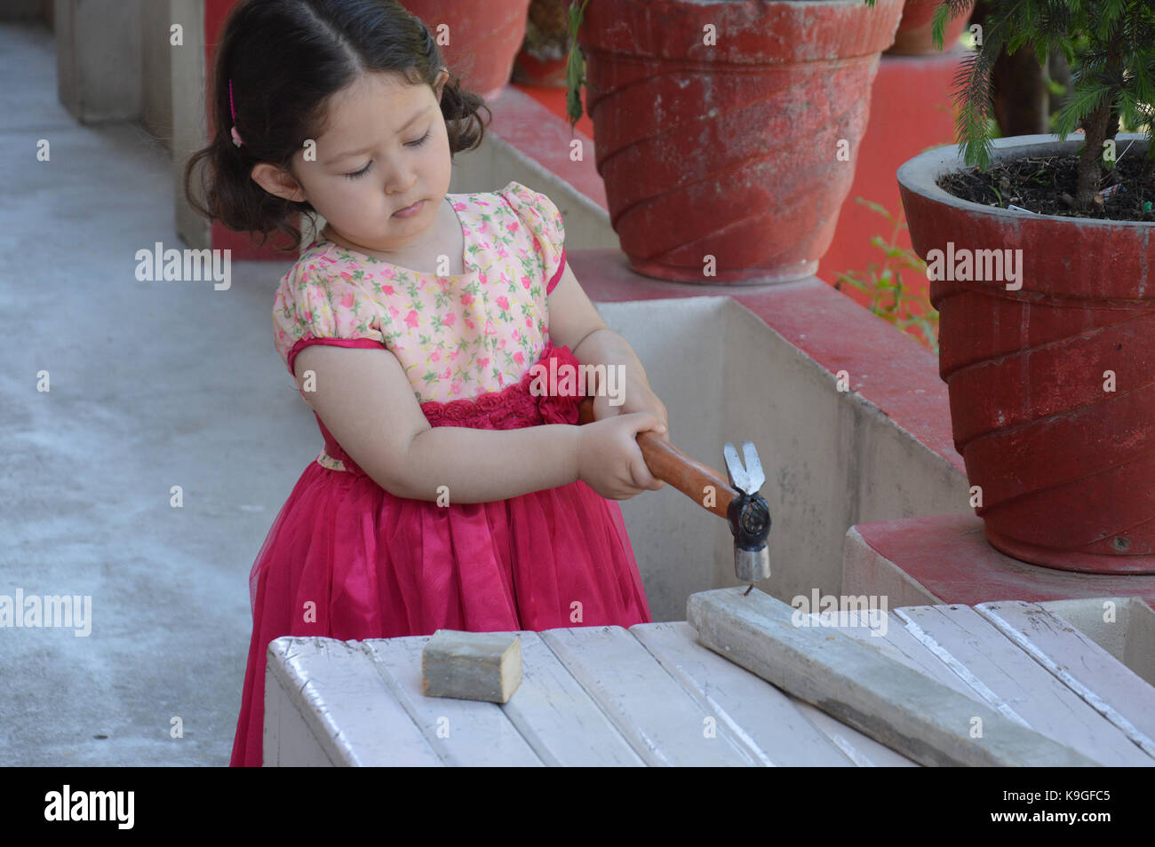 Little Girl Carpenter Stock Photo - Alamy