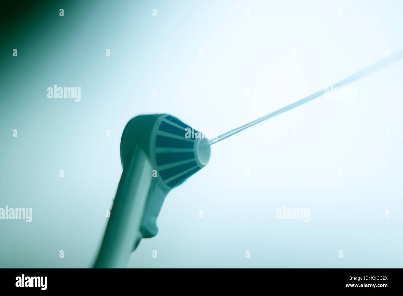 Dental water spray cleaner for interdental hygiene Stock Photo - Alamy