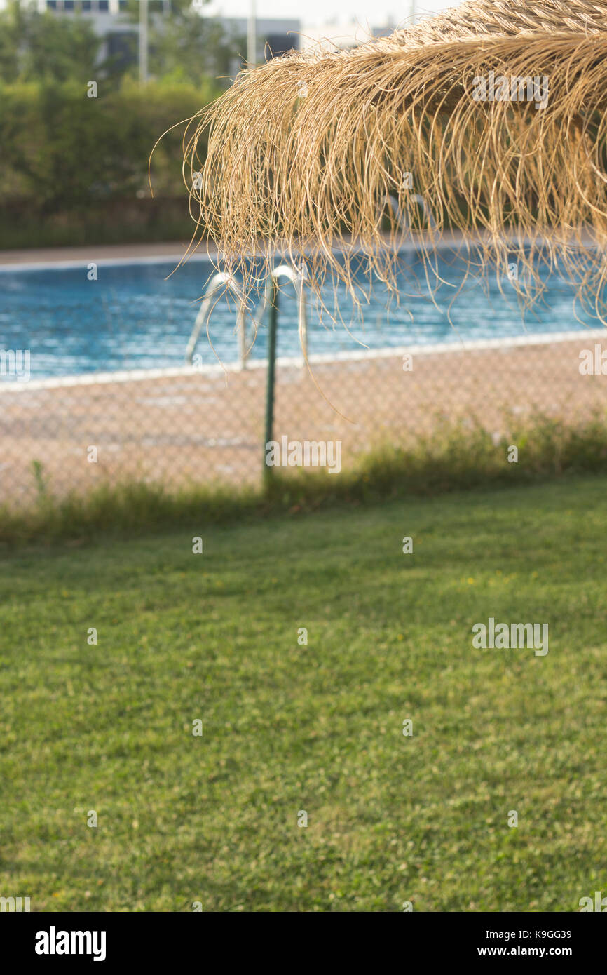 Blue swimming pool on hot sunny day on summer vacation Stock Photo - Alamy