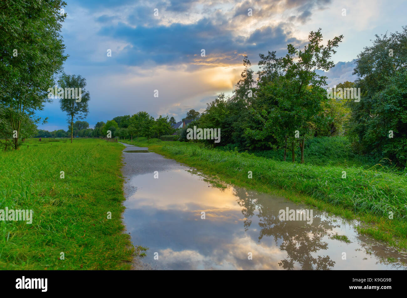 picture of a rural landscape at dusk with cloudy sky Stock Photo - Alamy