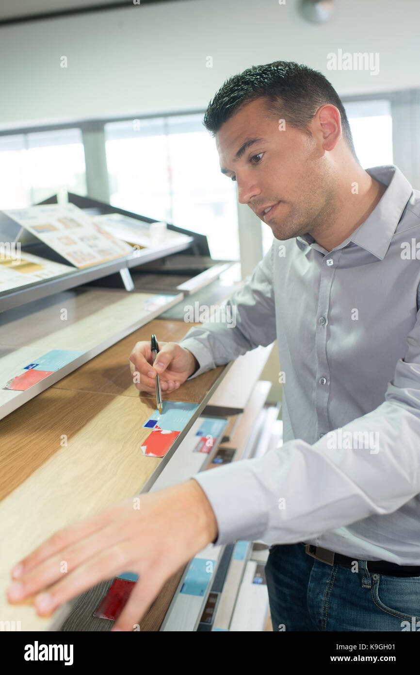man buying construction wood in a diy store Stock Photo - Alamy