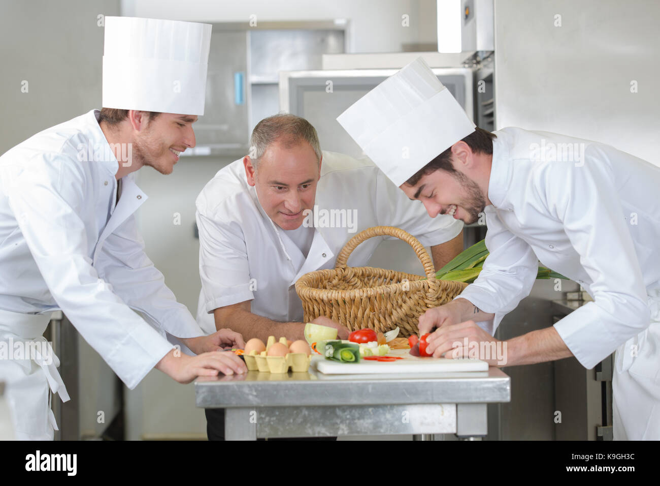 chef training students in restaurant kitchen Stock Photo - Alamy