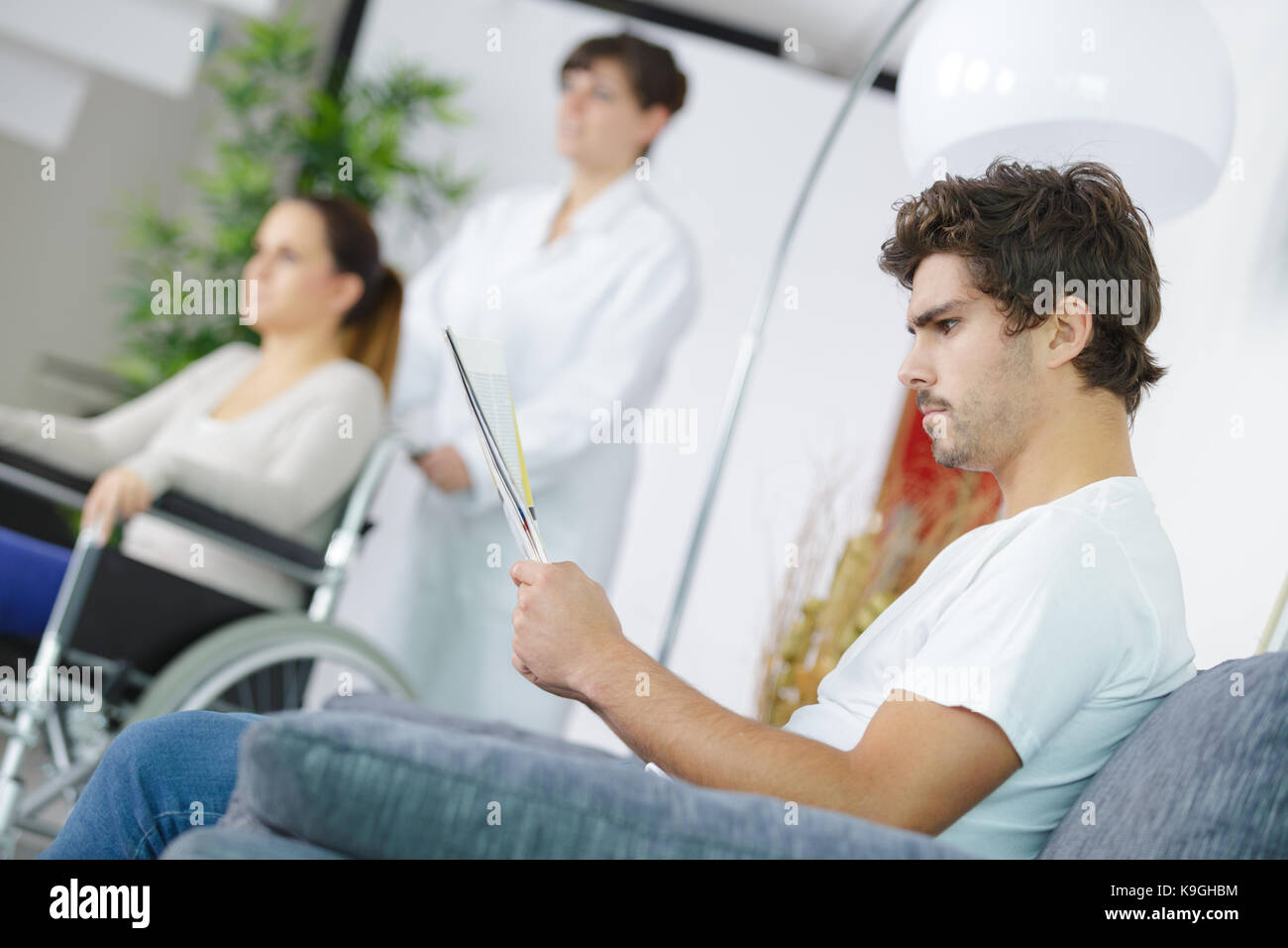 patients in doctors waiting room Stock Photo - Alamy