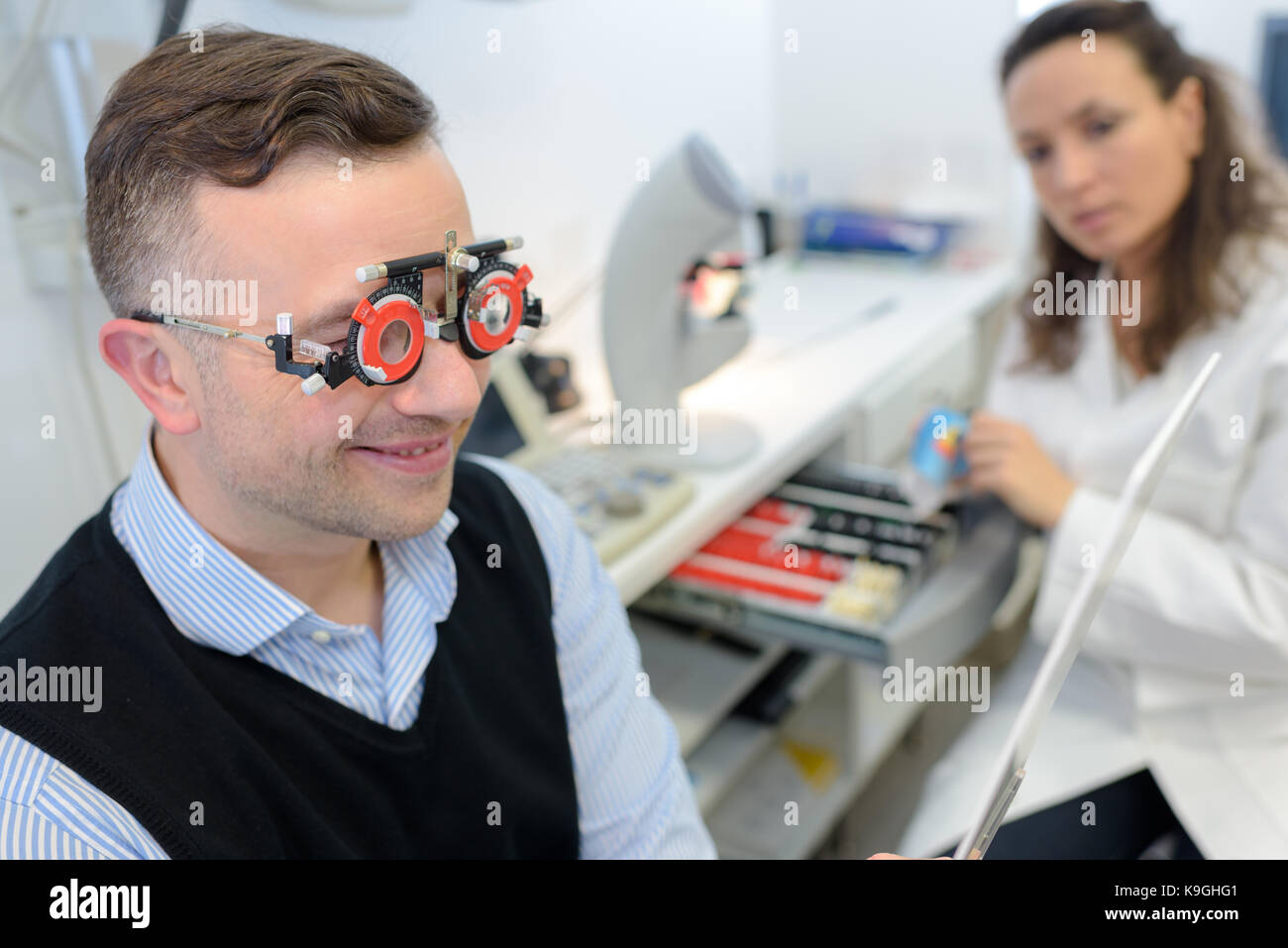 adult male visit an optometrist Stock Photo - Alamy