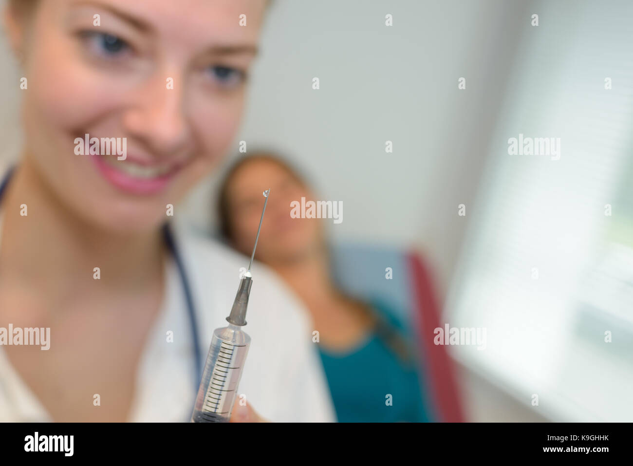 closeup of a female doctor with syringe Stock Photo - Alamy