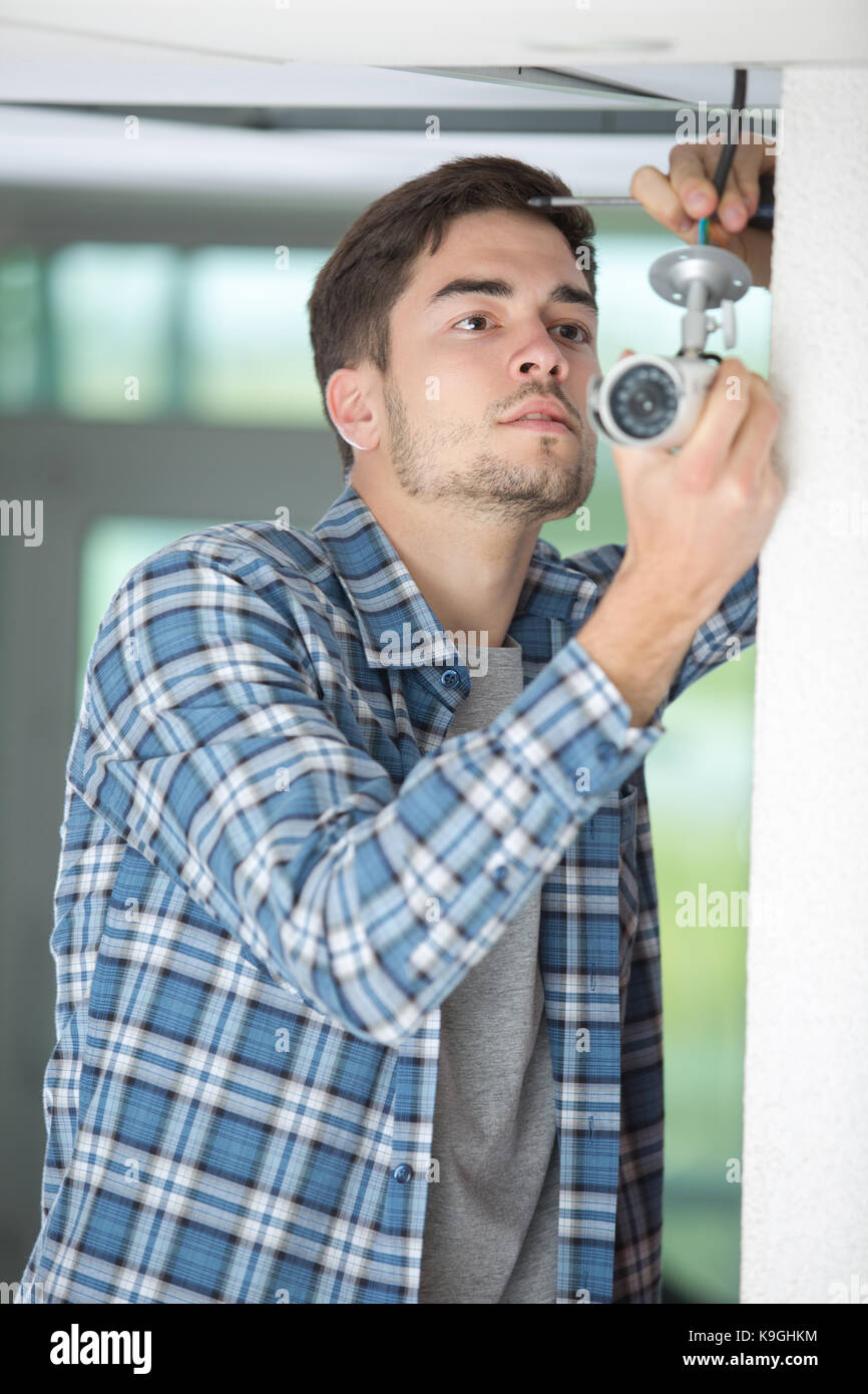 Engineer man working on cctv hi-res stock photography and images - Alamy