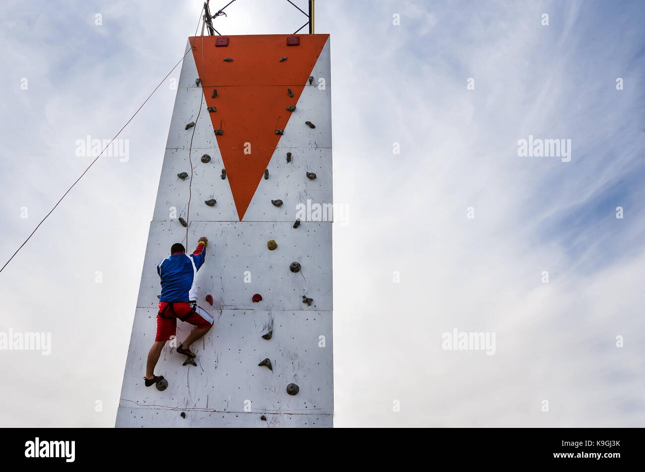 Person Practicing Extreme SportElderly Male Climber Makes Hard Move ...
