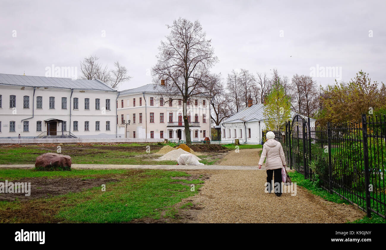 A woman walking on street in Suzdal town, Russia. Suzdal is one of the ...