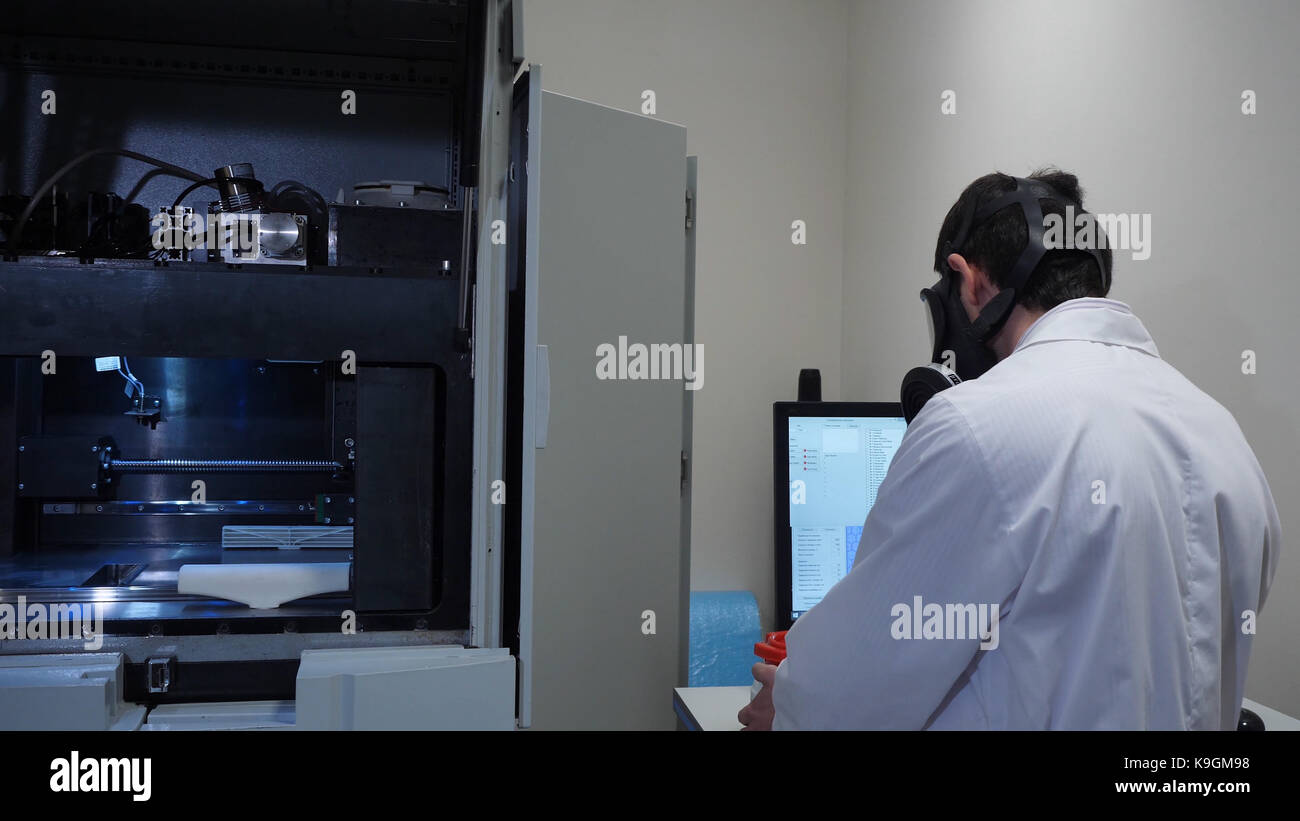 Male scientist in a gas mask in laboratory Stock Photo - Alamy