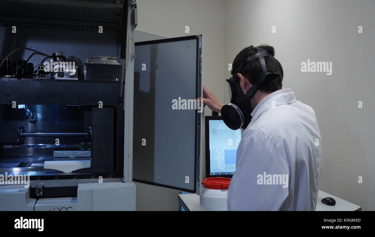 Male scientist in a gas mask in laboratory Stock Photo - Alamy