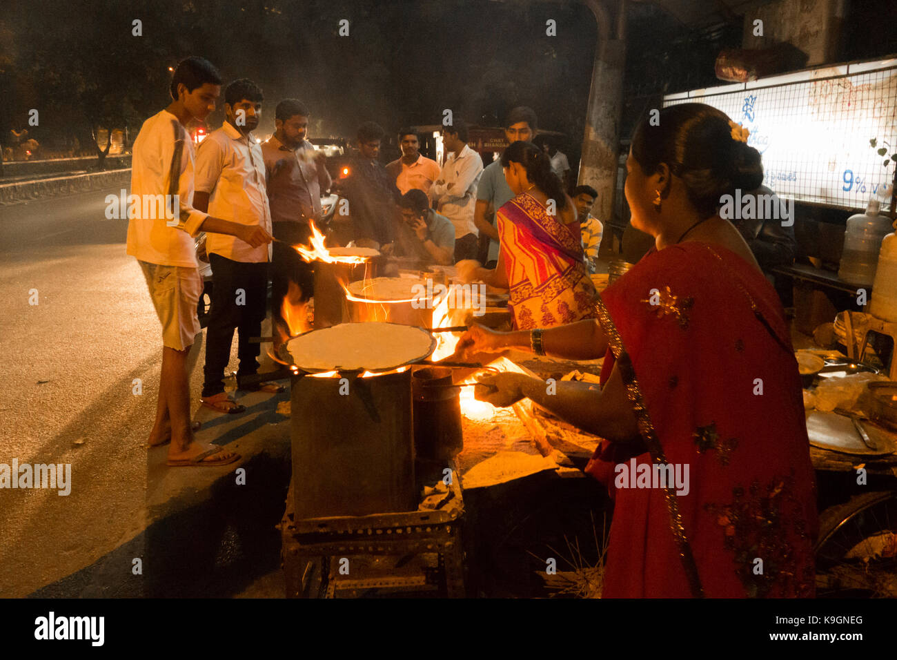 HYDERABAD,INDIA-22nd SEPTEMBER,2017.Indian women prepare Jowar Roti ...
