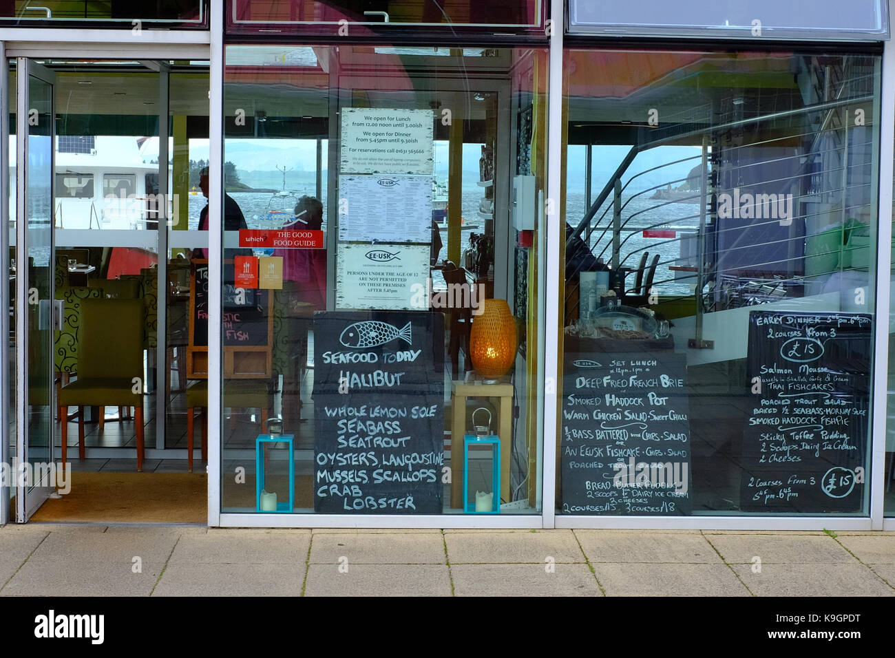 Cafe shop front window in Oban Scotland Stock Photo - Alamy