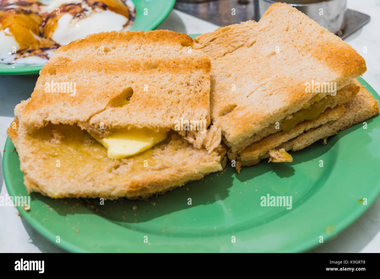 Traditional Singapore Breakfast called Kaya Toast, Bread with Coconut ...