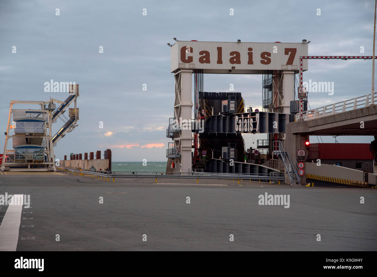 Loading ramp on dock 7 at Calais ferry port, dusk Stock Photo - Alamy