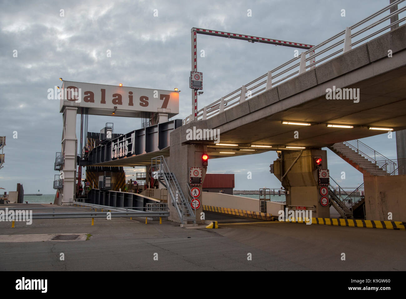 Loading ramp on dock 7 at Calais ferry port, dusk Stock Photo - Alamy