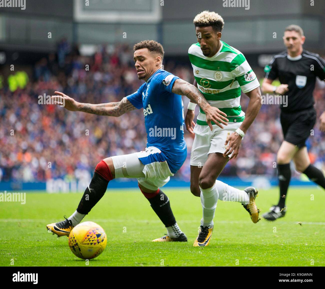 Rangers James Tavernier (left) and Celtic's Scott Sinclair battle for ...
