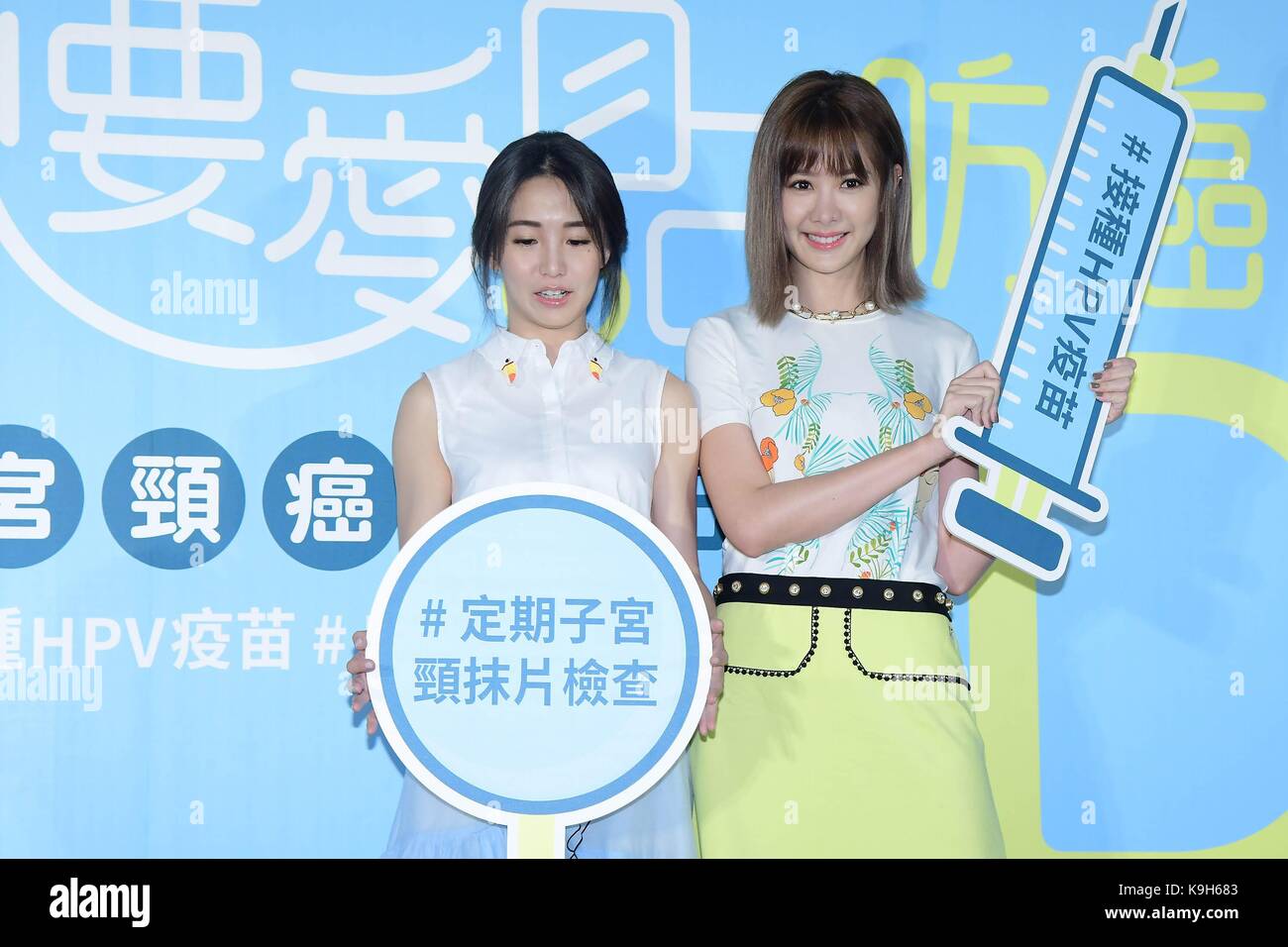 Taiwanese singers, actresses and TV hostesses Amber An, right, and Kuo ...