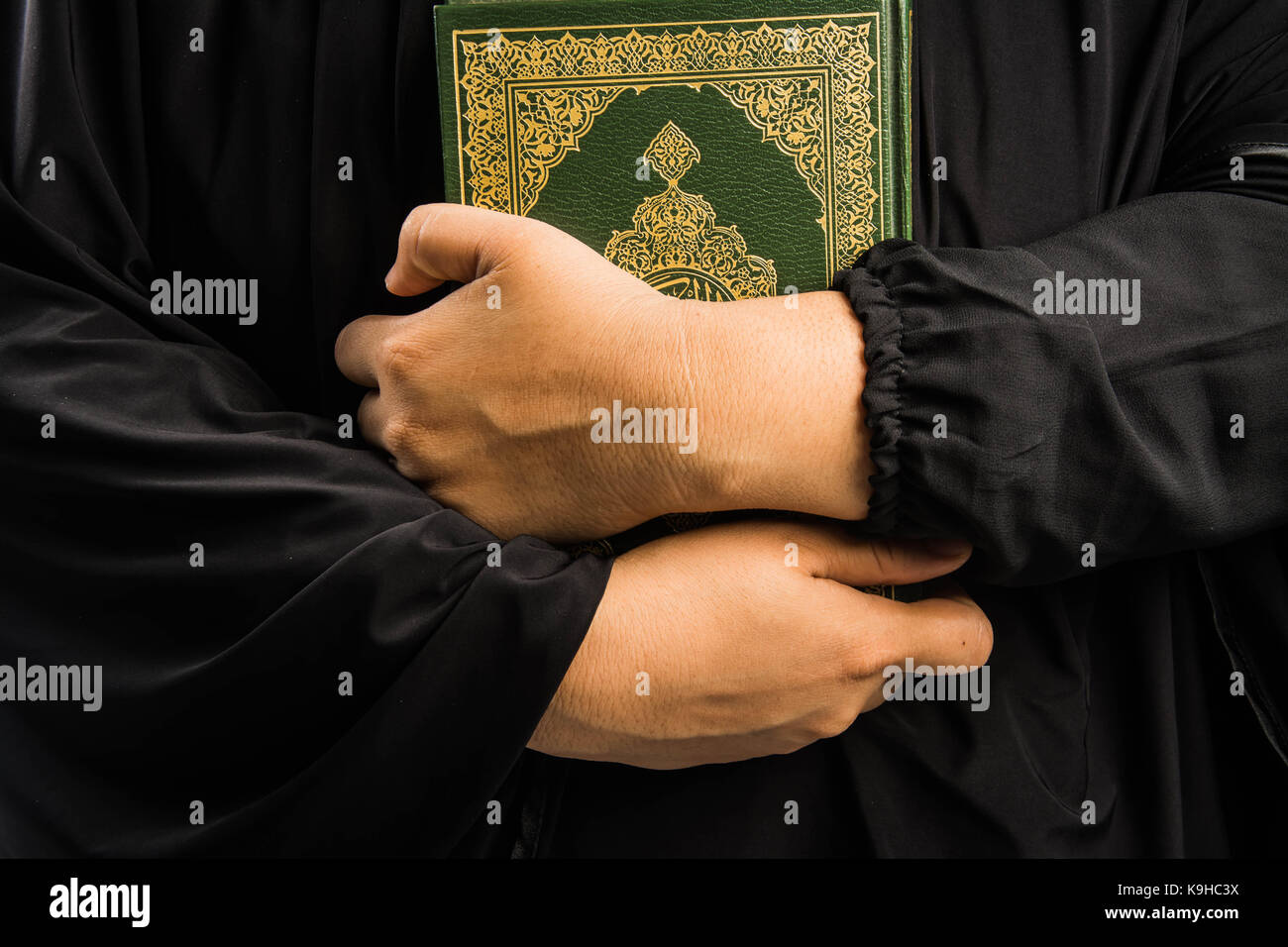 Koran in hand - holy book of Muslims( public item of all muslims )Koran ...