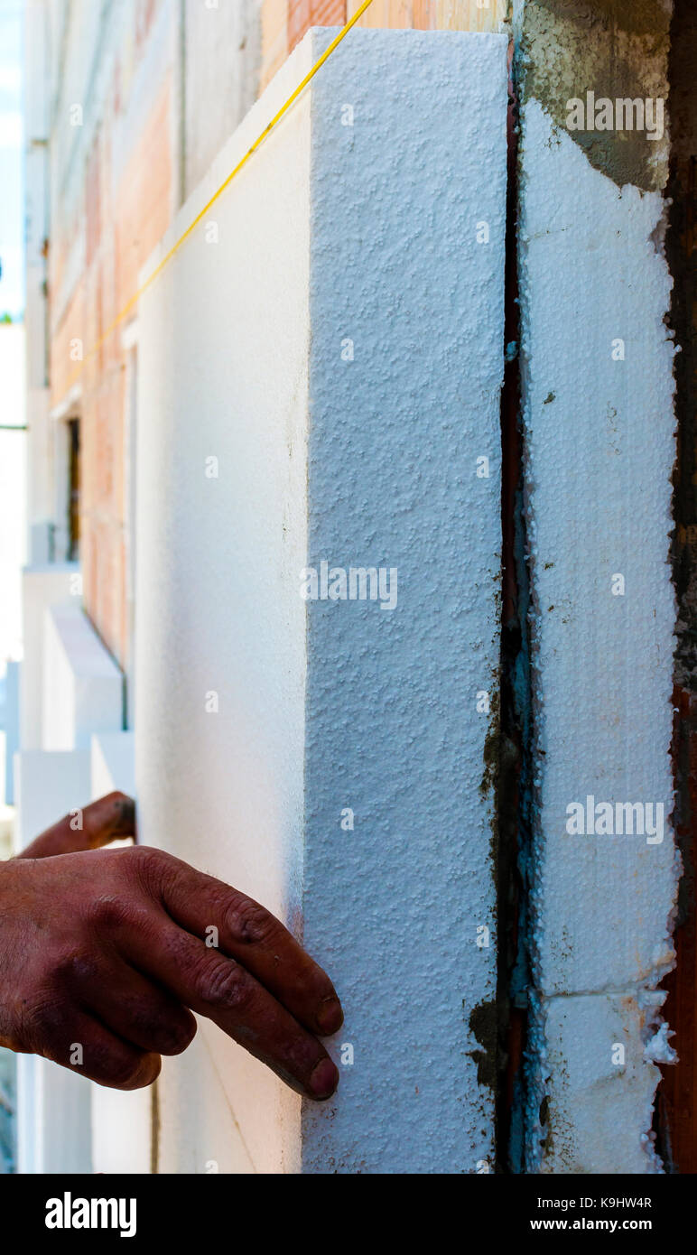 Construction site - Installing external insulation Facade therm Stock ...