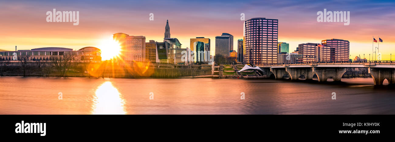 Hartford skyline and Founders Bridge at sunset. Hartford is the capital ...