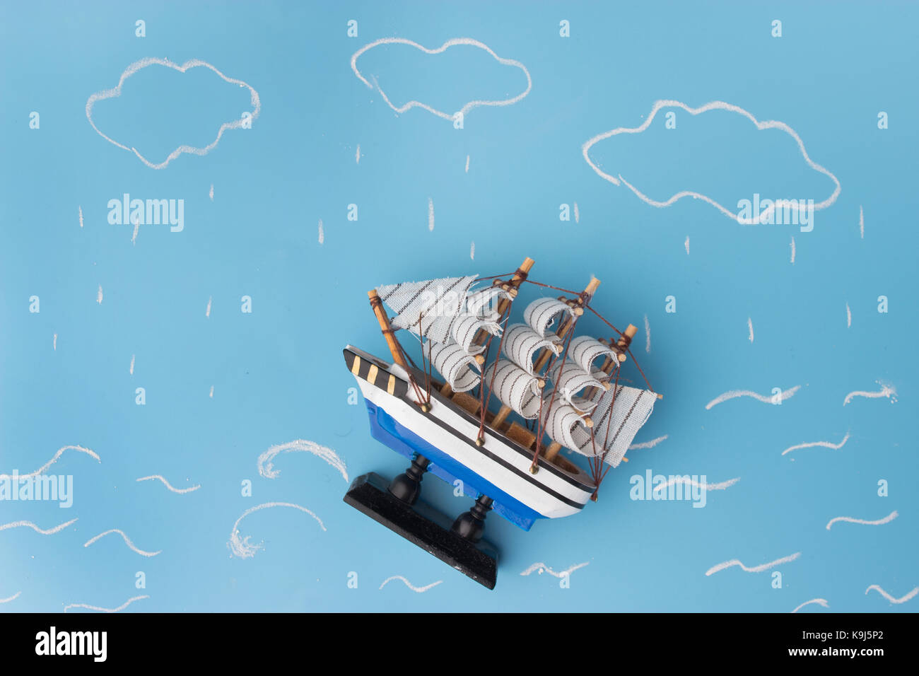 ship model in a storm. danger concept Stock Photo - Alamy
