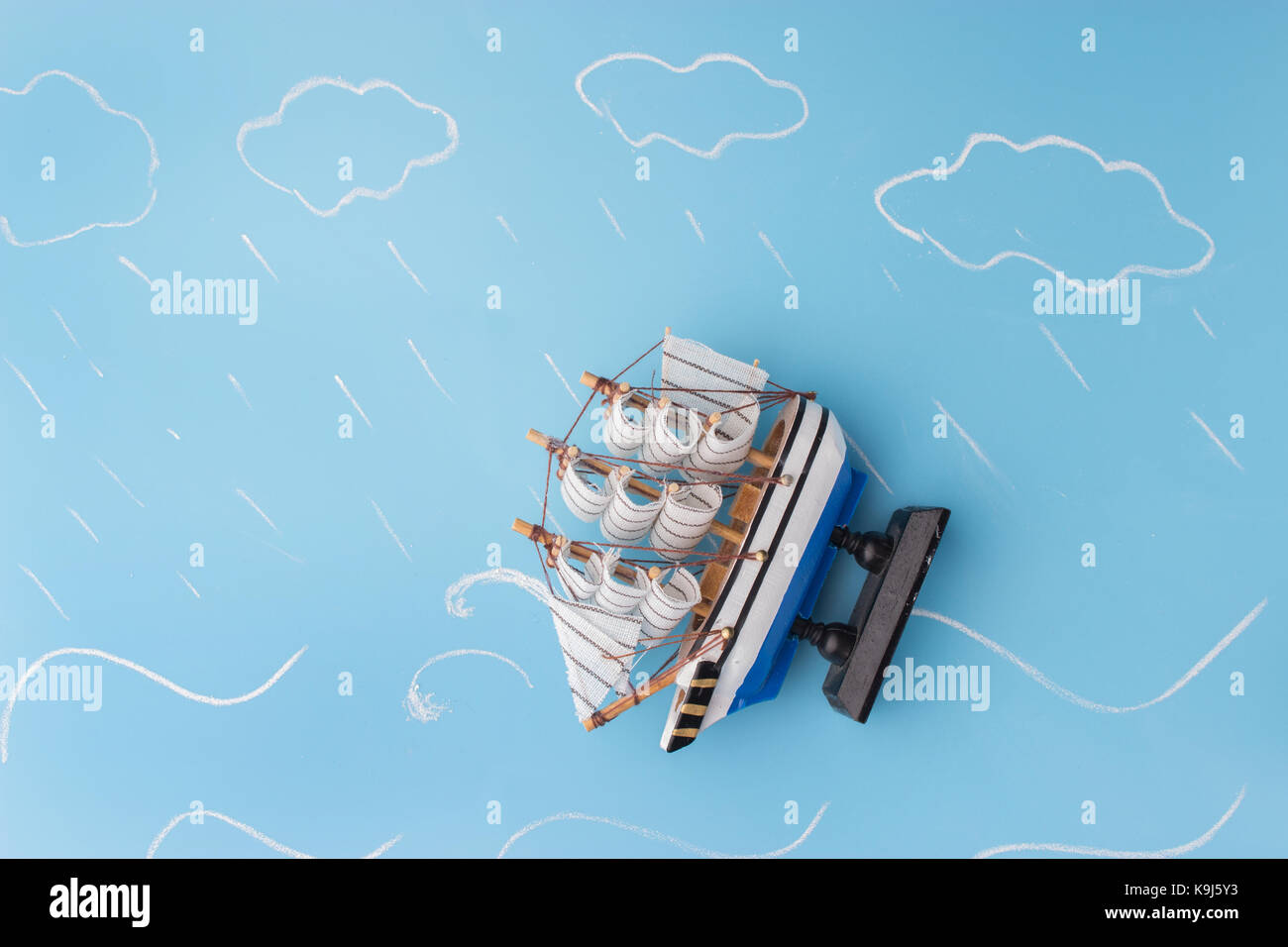 ship model in a storm. danger concept Stock Photo - Alamy