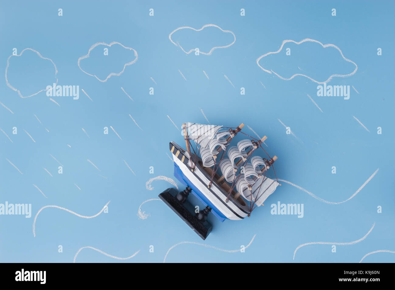ship model in a storm. danger concept Stock Photo - Alamy