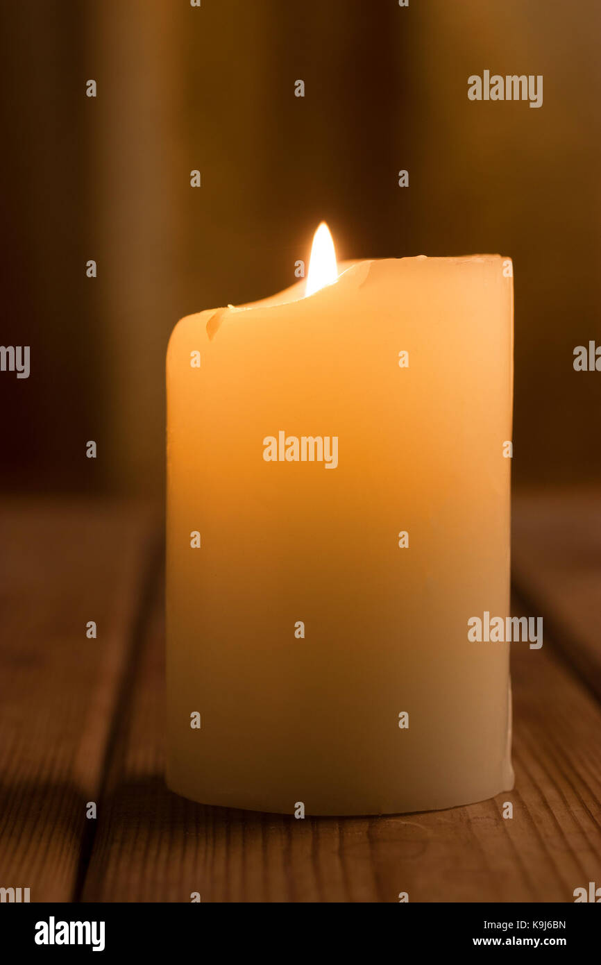single big candle burning. valentine day. halloween Stock Photo - Alamy