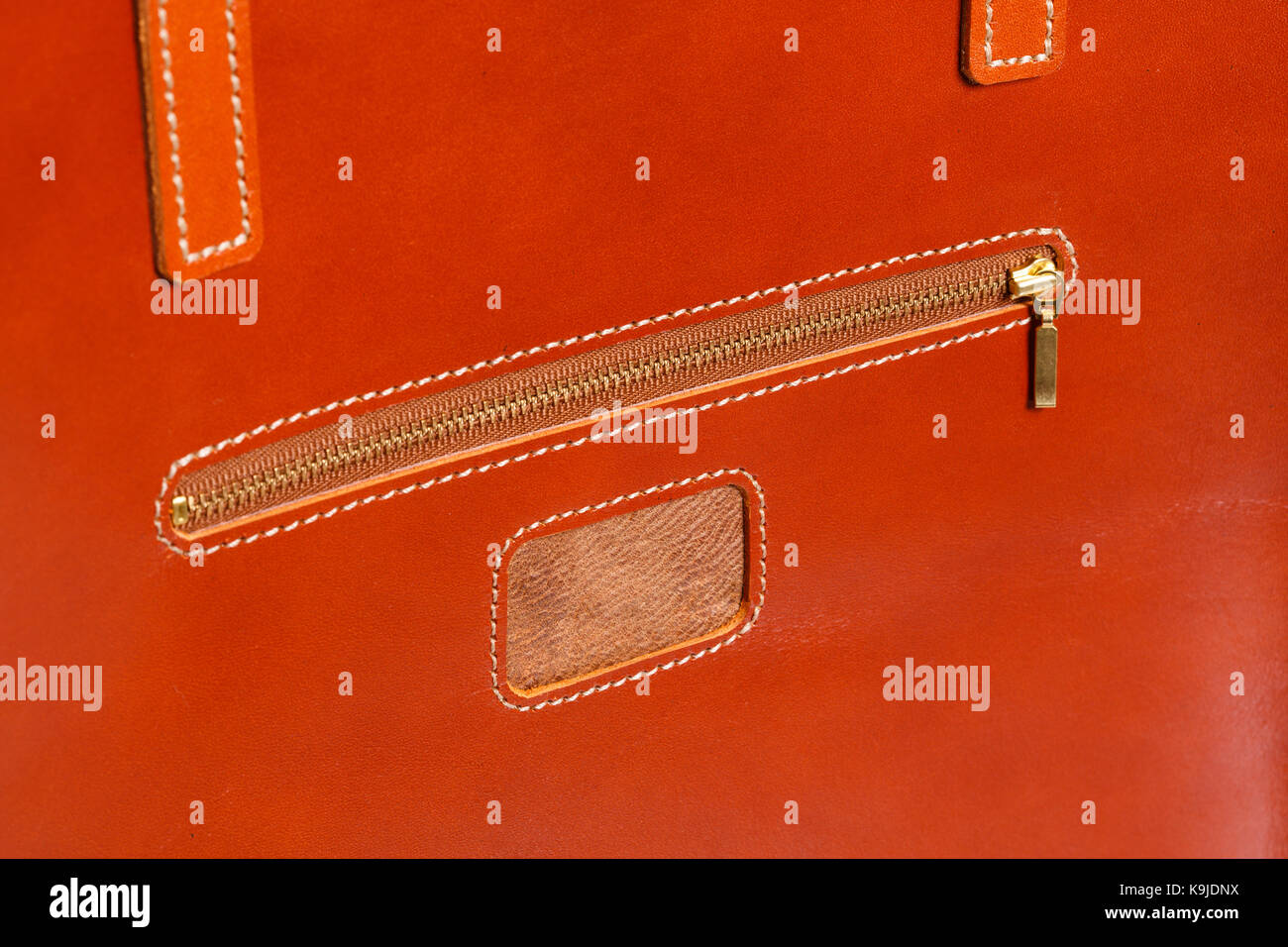 Closeup of brown leather briefcase with brass buckle. High resolution ...
