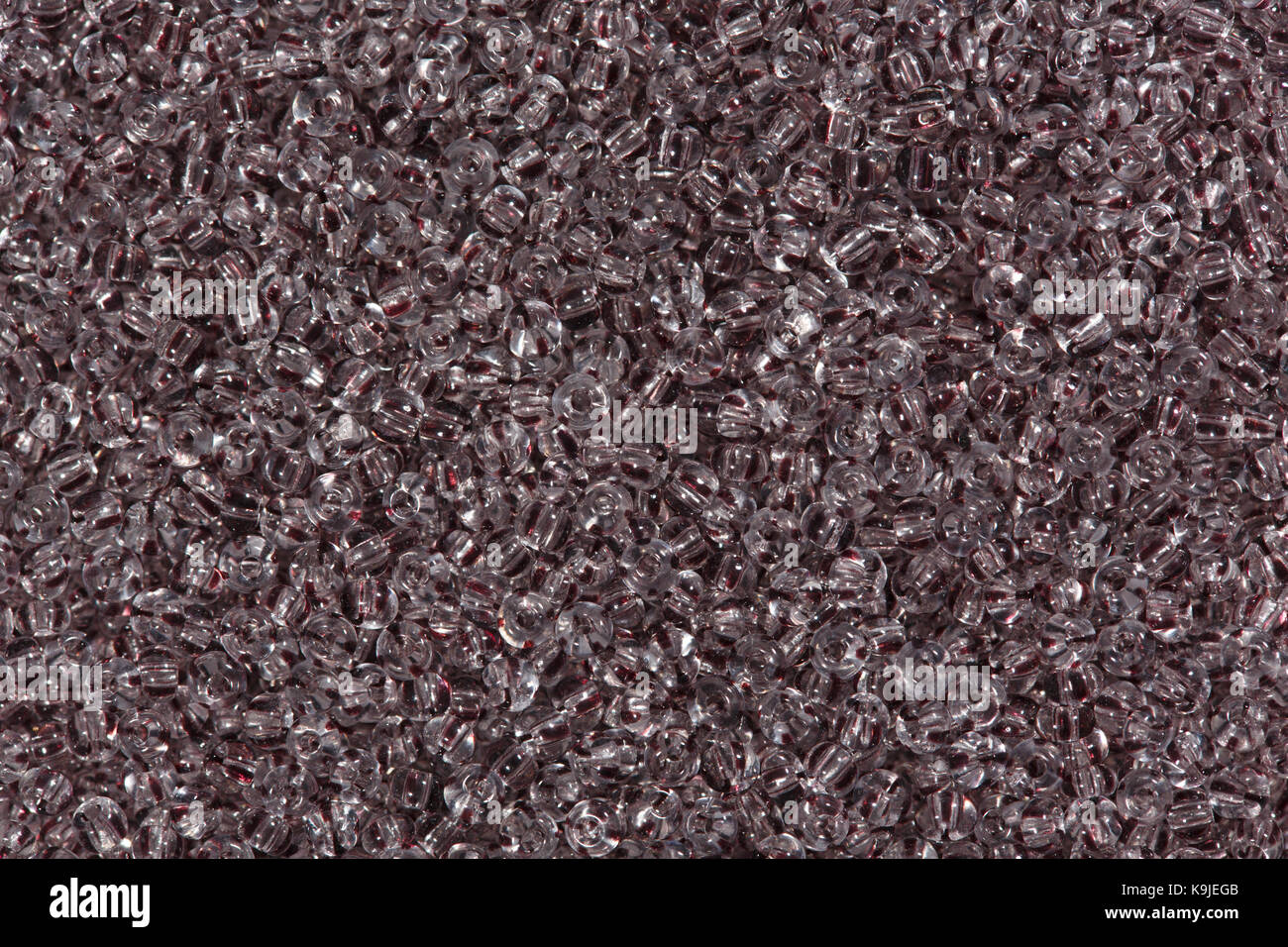 Close up of dim grey seed beads Stock Photo - Alamy