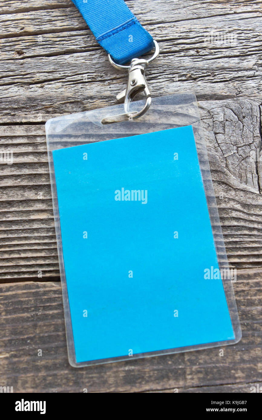 Blank ID card tag on wooden background Stock Photo - Alamy