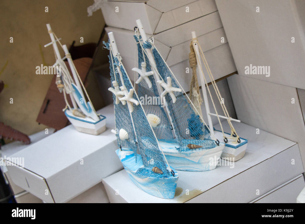 Set of small colorful model boats Stock Photo - Alamy