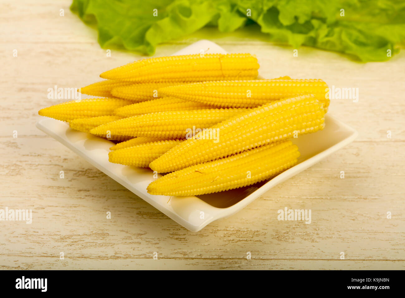 Young raw baby corn Stock Photo - Alamy