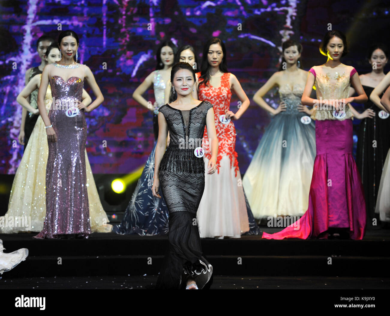Beijing, China. 23rd Sep, 2017. Contestants compete in the evening gown ...