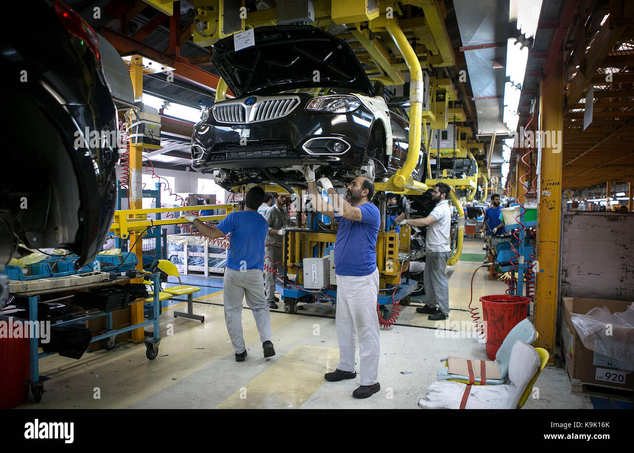 Tehran, Iran. 23rd Sep, 2017. Iranian employees work on a Brilliance ...